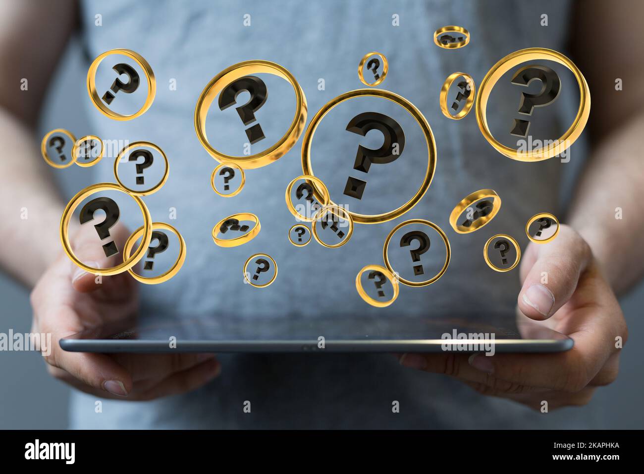 A man presenting 3D rendered question mark above the tablet screen in his hands Stock Photo - Alamy