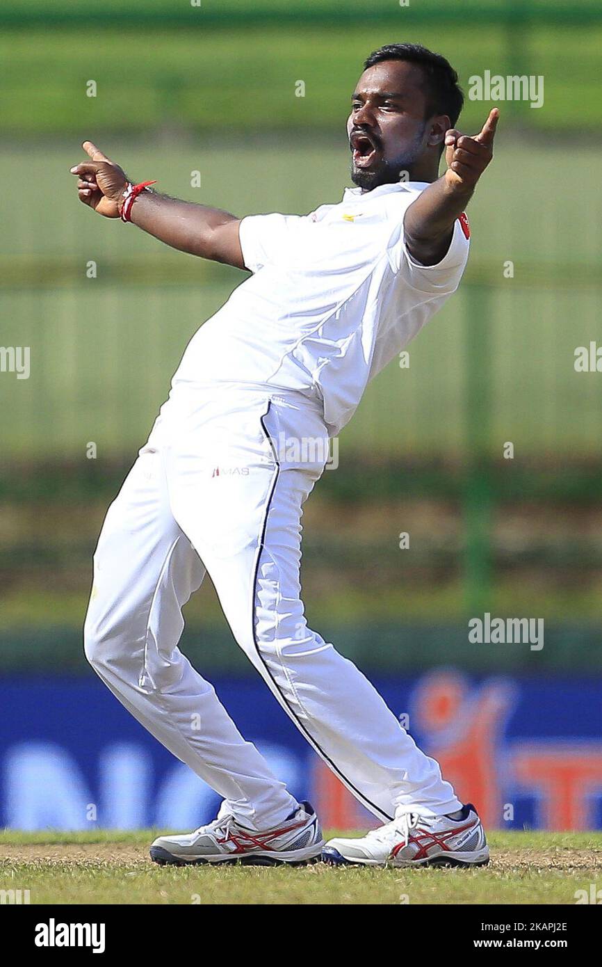 Sri Lankan cricketer Malinda Pushpakumara celebrates the dismissal of ...