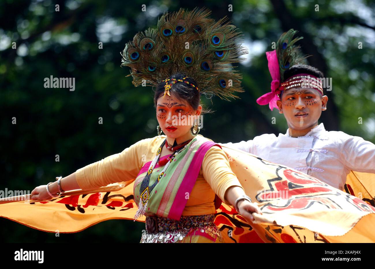 Bangladeshi indigenous artists perform music and dance as they ...