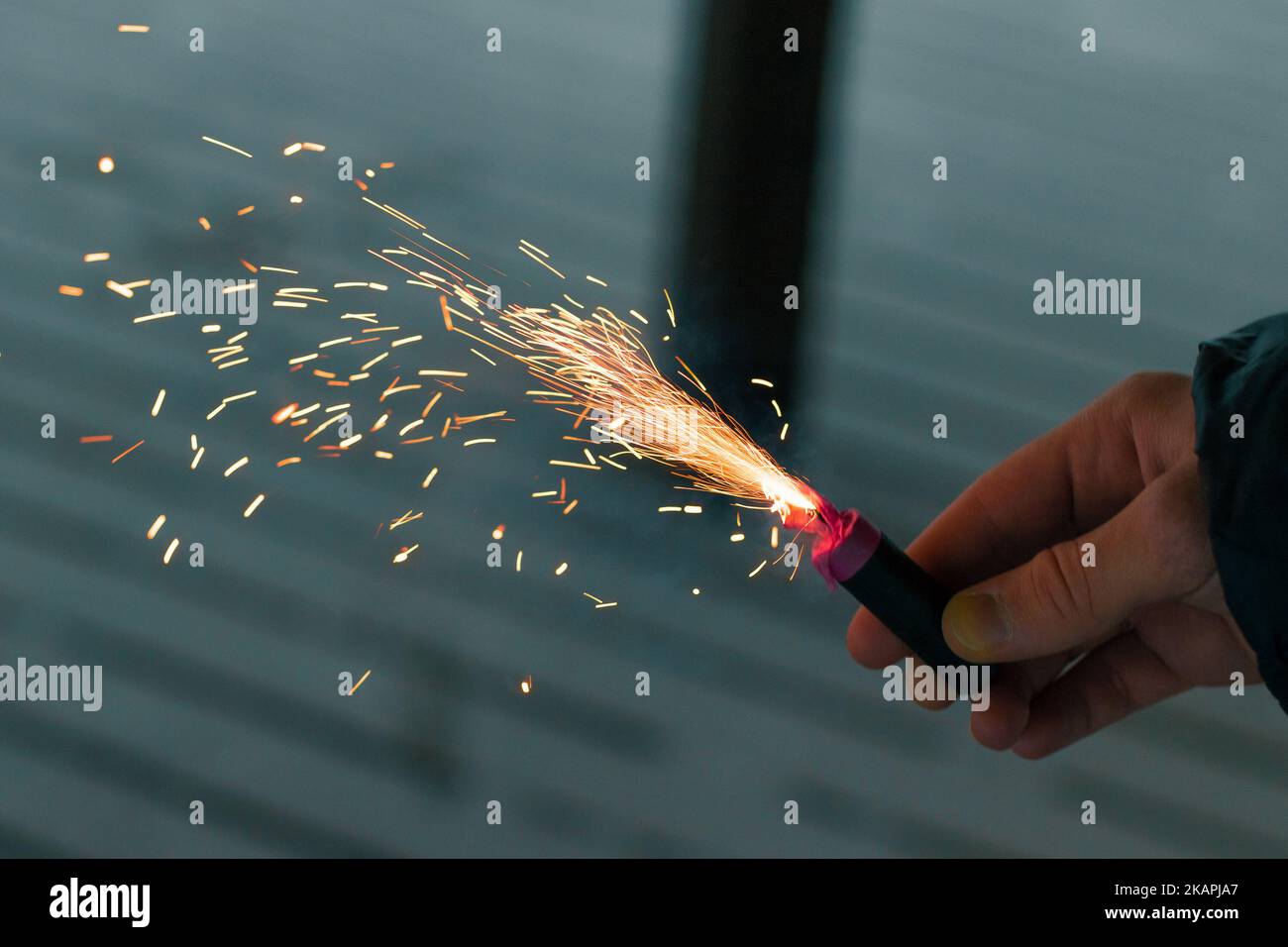 Burning Firecracker with Sparks. Guy Holding a Petard in a Hand. Loud ...