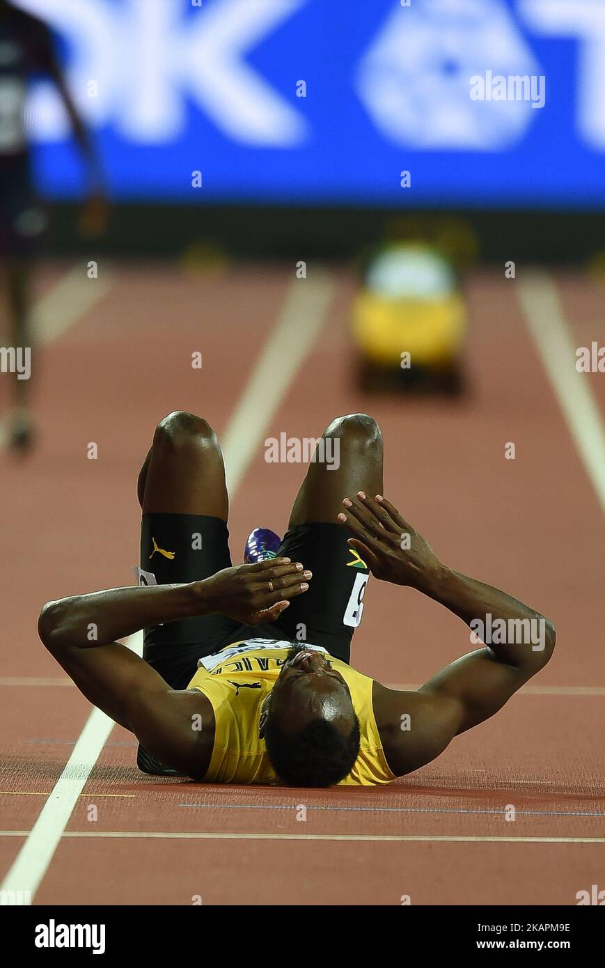 Usain Bolt of Jamaica, competes in his final 4 x 100 meter final in ...