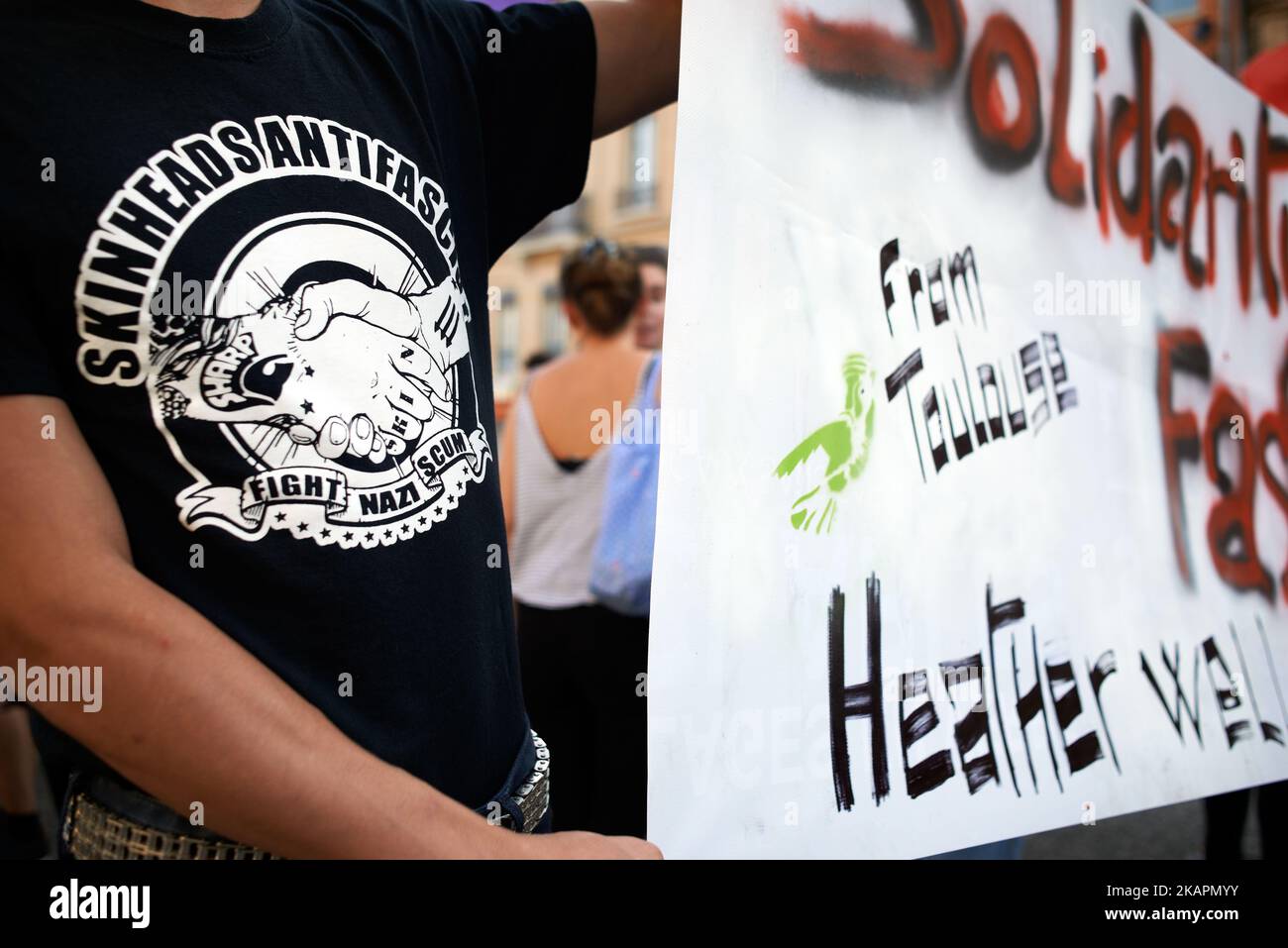 An anti-fascist wears a shirt reading 'Fight Nazi Scum' during a ...