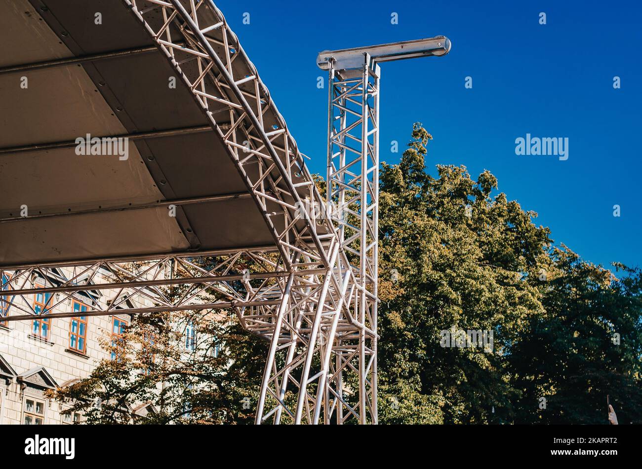 Metal trusses. Metal structures for stage installation. Blue sky ...