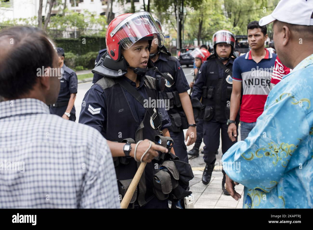 The Light Strike Force (LSF) of Malaysian Police stand guards outside ...