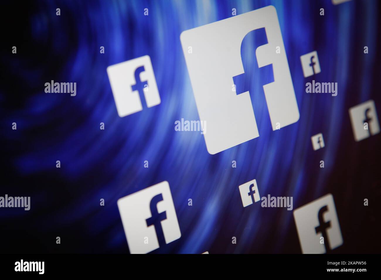 Facebook logos are seen on a screen in this photo illustration on 28 ...