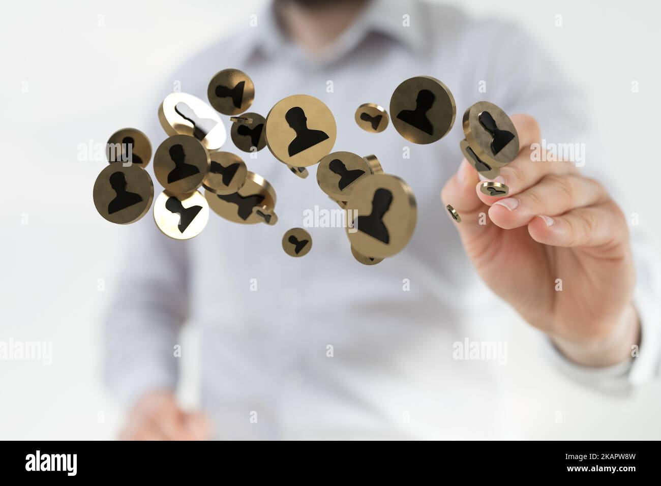 A finger pointing at a group of digital human profile icons - a team ...