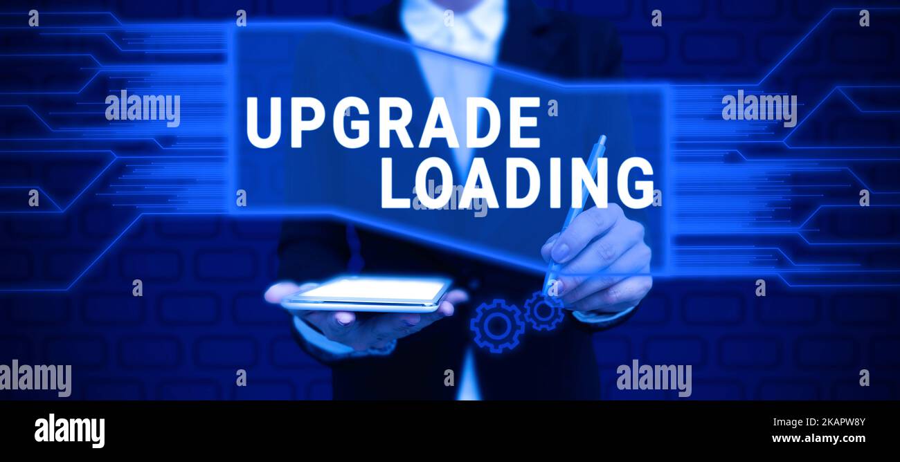 Hand writing sign Upgrade Loading. Business approach advancement of applications to more ...
