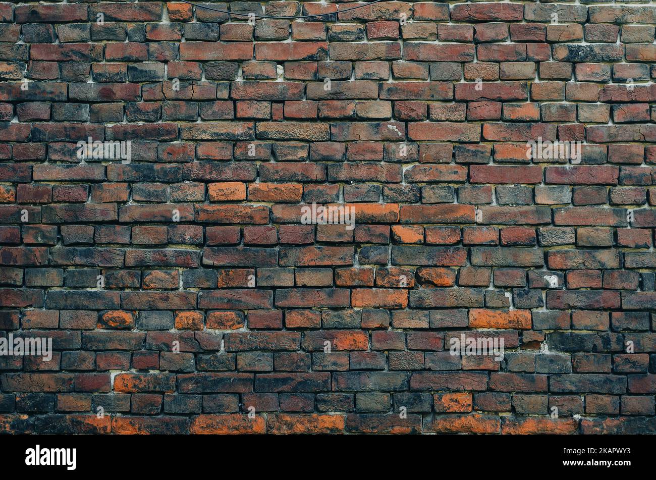 Vintage dark brick wall. Brickwork with cracks. Abstract background ...