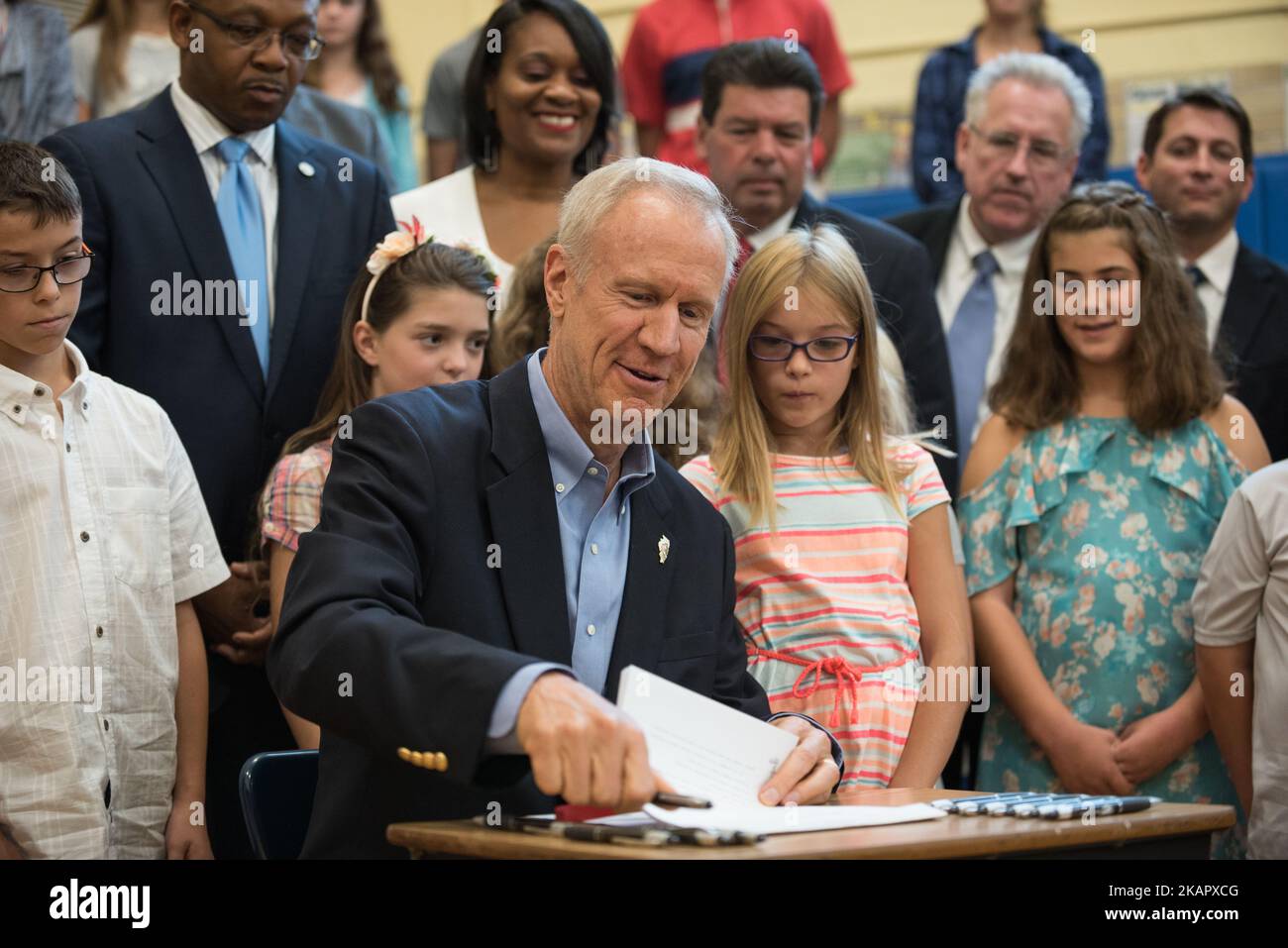 Illinois Gov. Bruce Rauner signs education funding reform bill SB 1947 ...