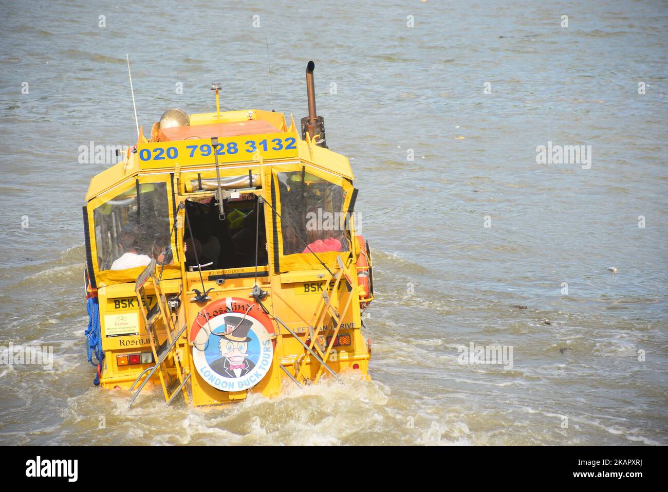 A London Duck Tours hybrid bus is pictured while starts its tour ...