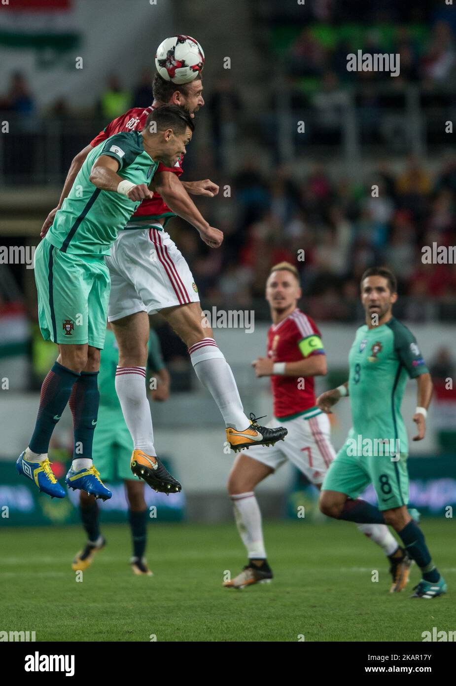 Pepe (L) of Portugal in action with Daniel Böde (R) of Hungary during ...