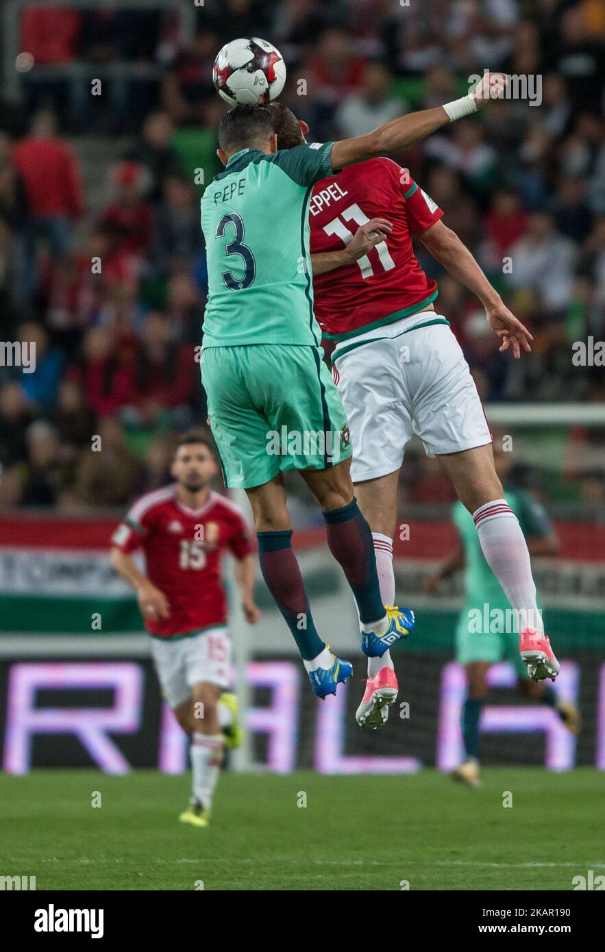 Pepe (L) of Portugal in action with Márton Eppel (R) of Hungary during ...