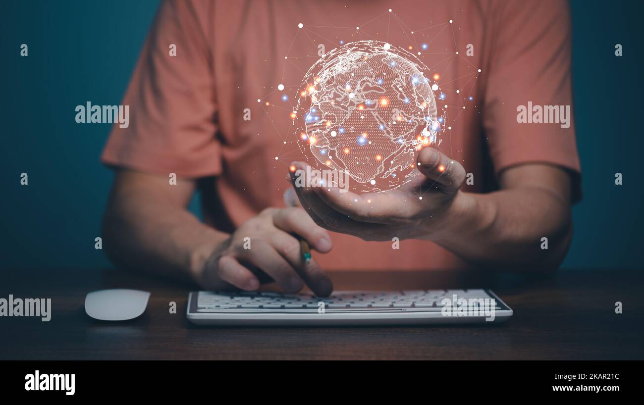 Leaning Online concept, Man Hand using computer and holding Global ...