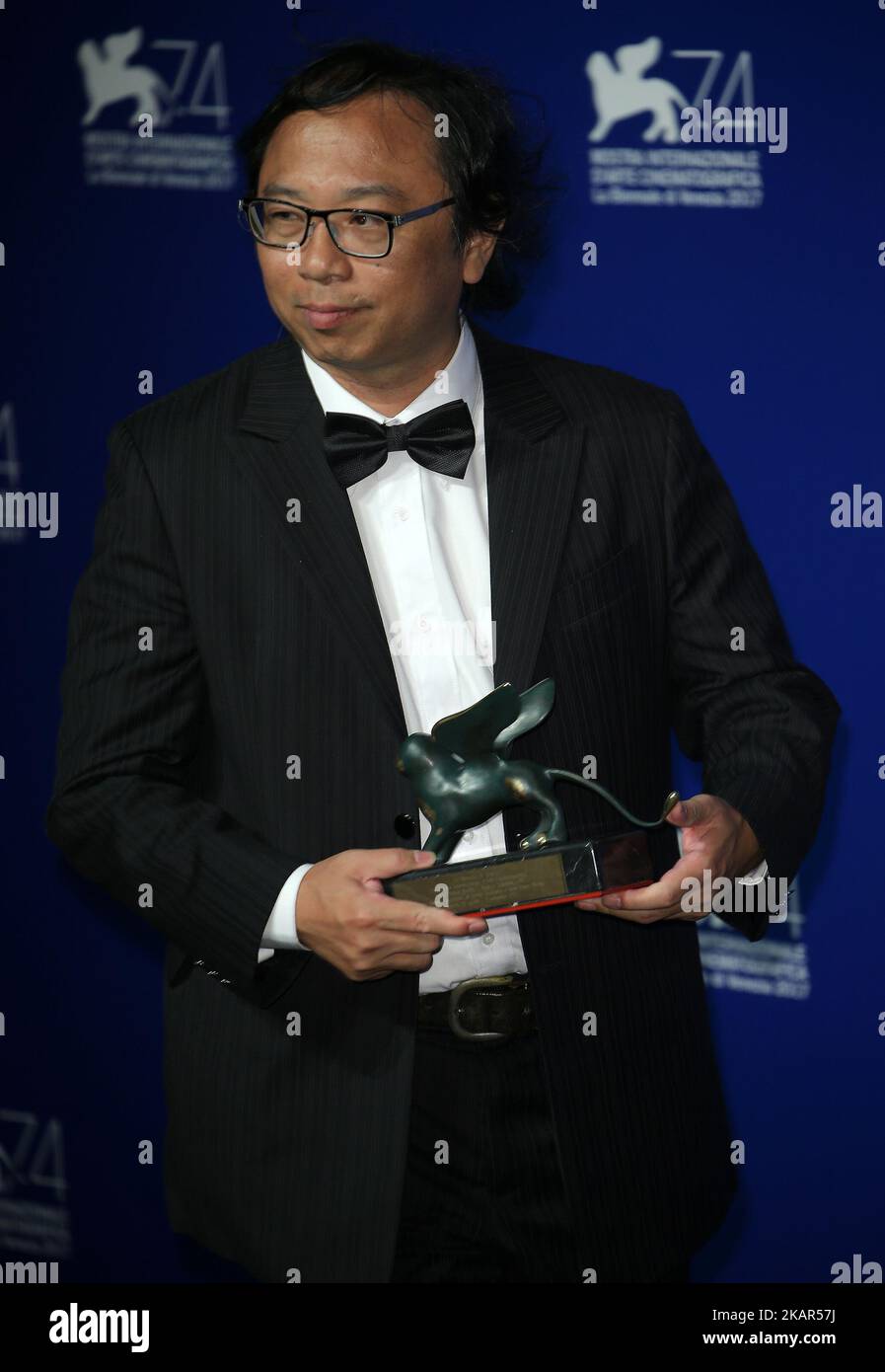 Hsin-Chien Huang poses with the Best VR Experience Award for 'La Camera ...