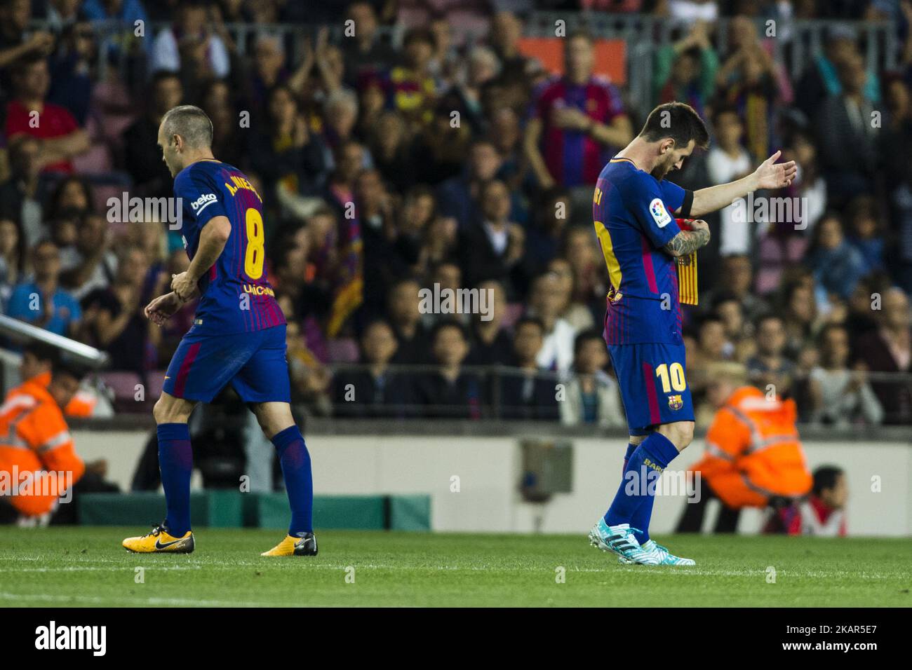 Andres Iniesta from Spain of FC Barcelona giving the captain bracelet ...