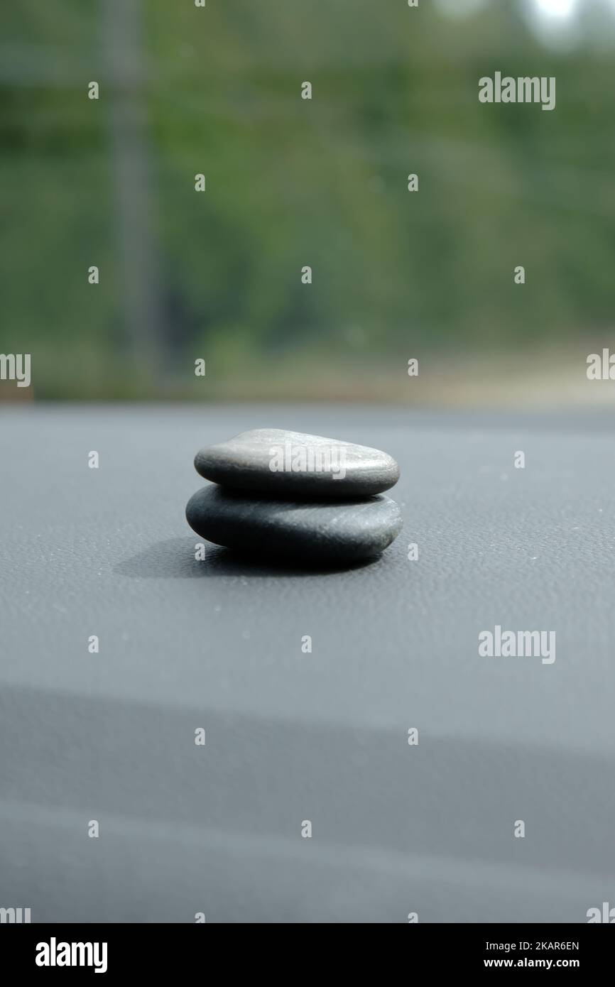 The two pebbles balanced on top of each other Stock Photo - Alamy