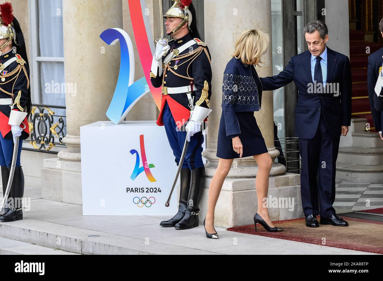 French President Emmanuel Macron and his wife Brigitte welcome former ...