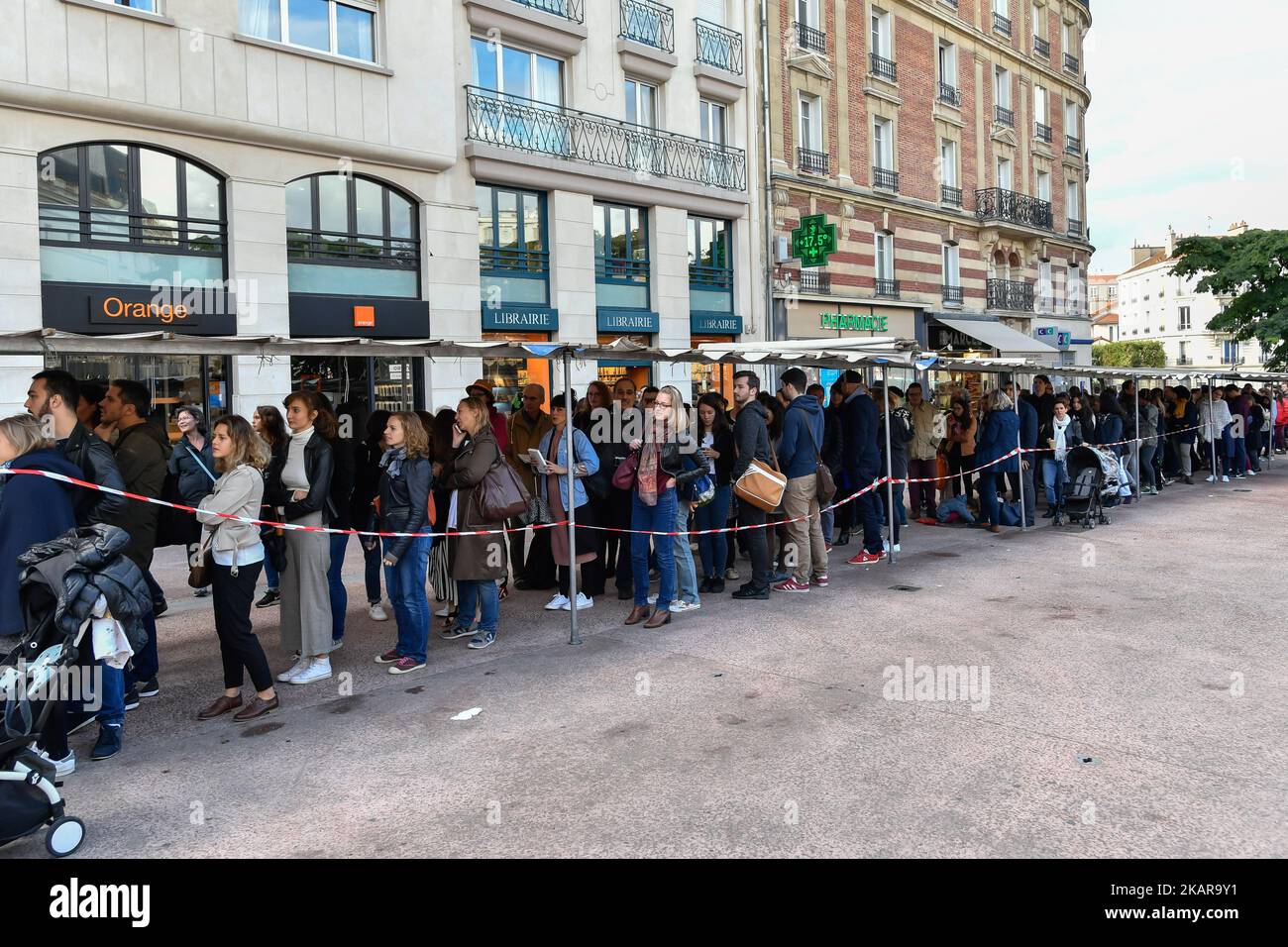 The street artist JR performing the Inside Out Project at the Mairie d ...