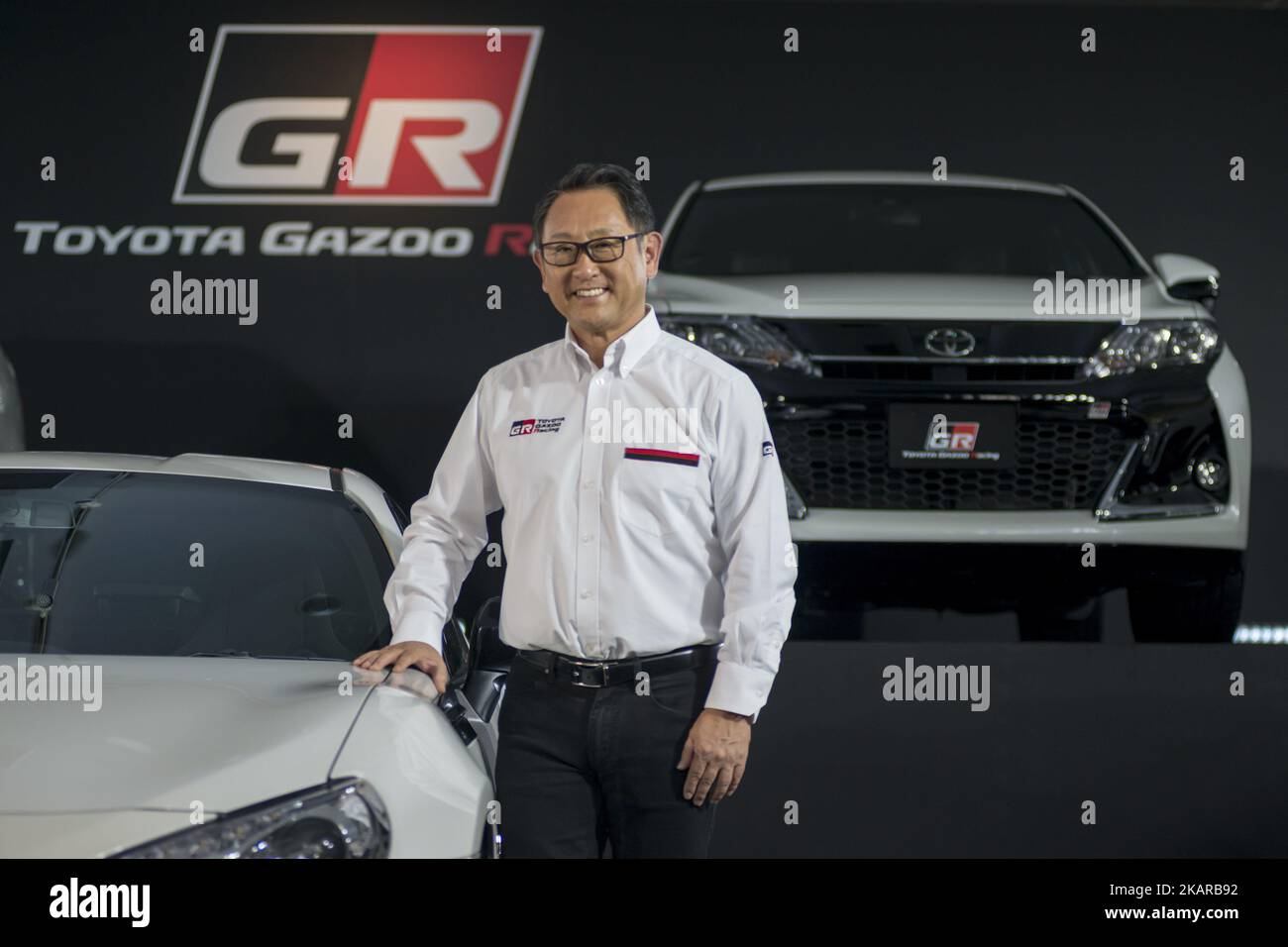 Toyota Motors president Akio Toyoda poses beside a GR86 vehicle during ...