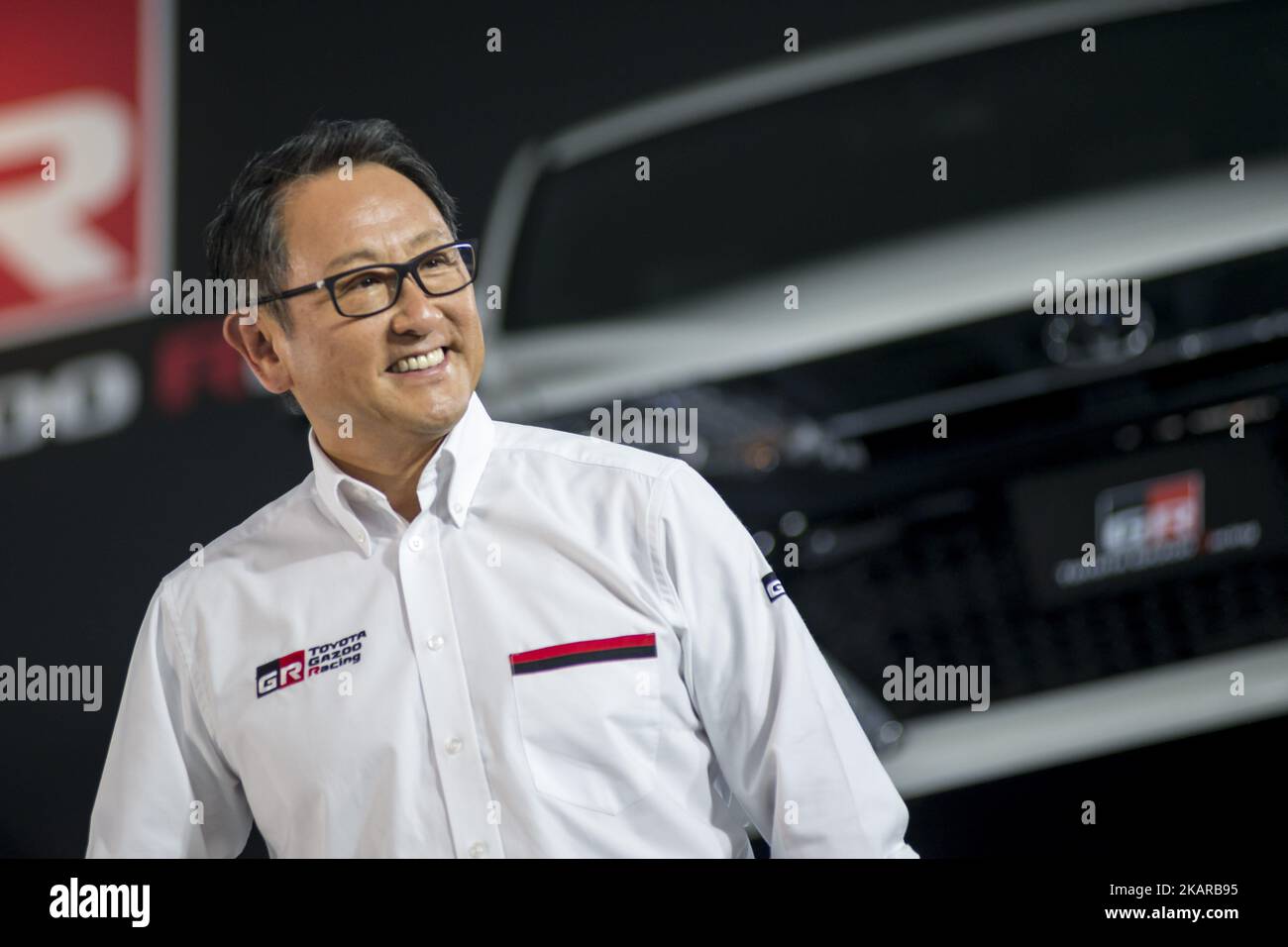 Toyota Motors president Akio Toyoda poses beside a GR86 vehicle during ...