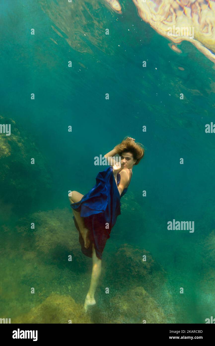 Girl underwater dress hi-res stock photography and images - Alamy