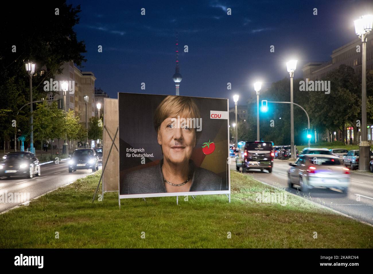 A vandalized election poster of German Chancellor Angela Merkel (CDU ...