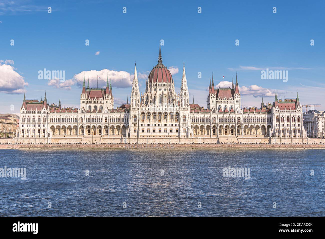 A scenic shot of the Hungarian Parliament Building against the blue sky ...