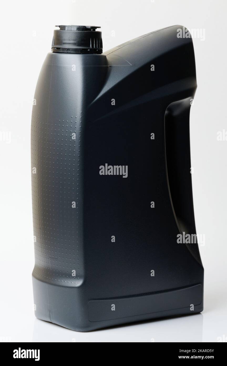 Perspective view on black plastic bottle isolated on studio background ...