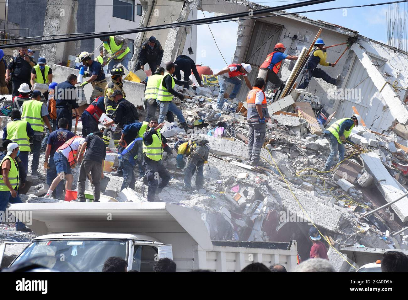 Rescuers are seen during the helping people after 7.1 earthquake ...