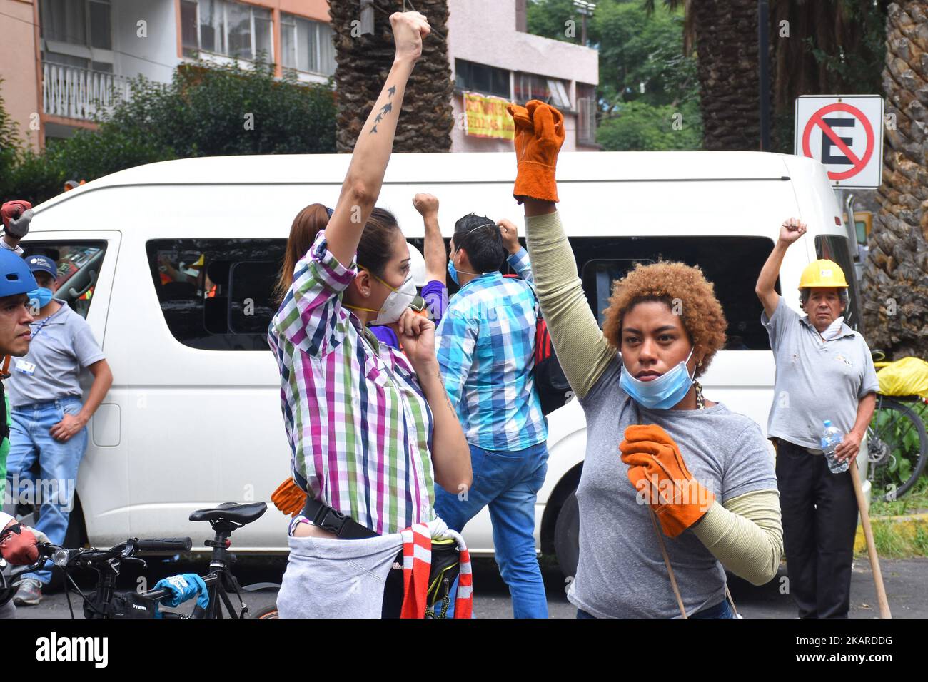 voluntaries are seen helping during the rescue of a person by the 7.1 ...