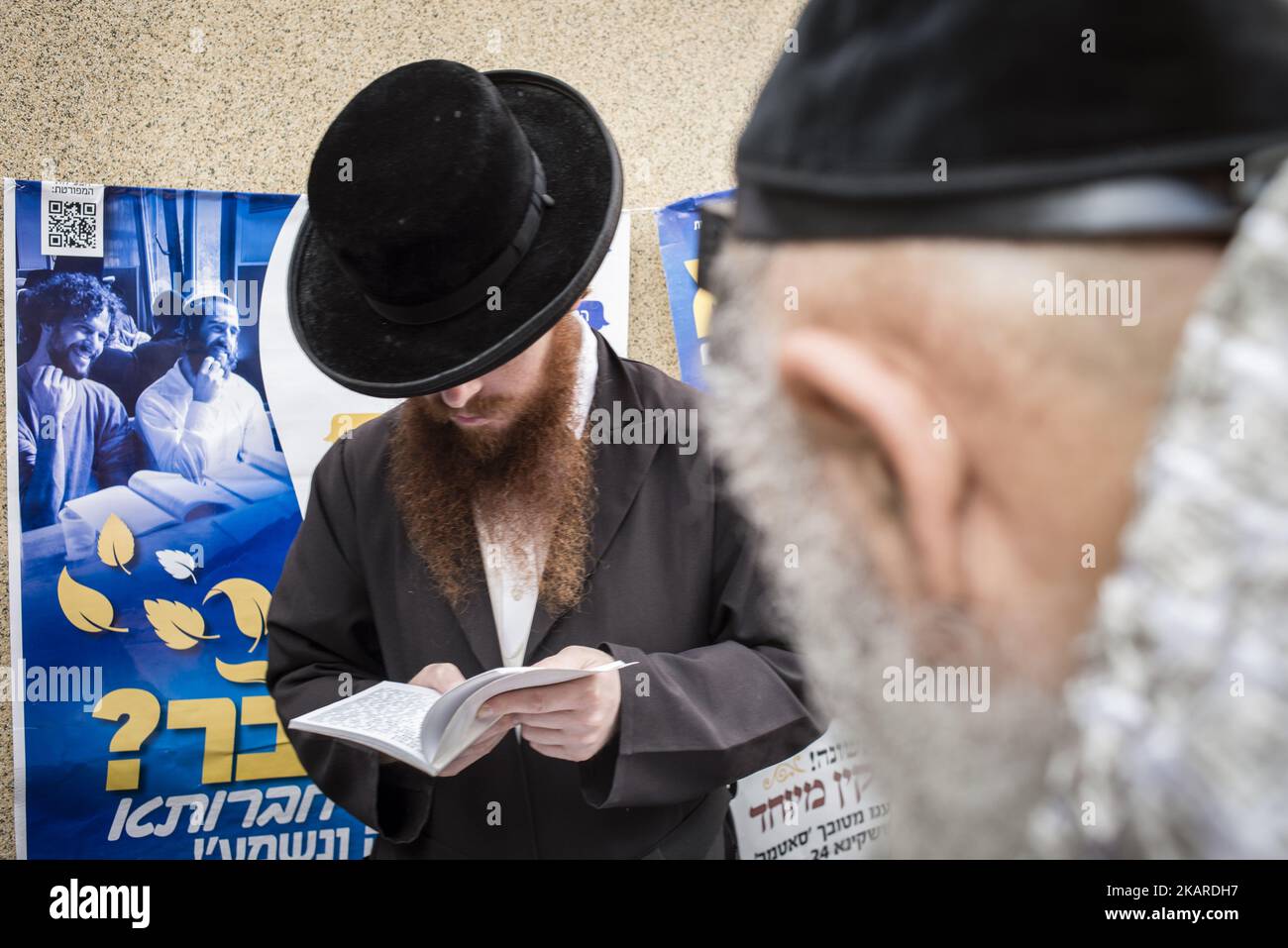 Orthodox Jewish pilgrims pray near the tomb of Rabbi Nachman while ...
