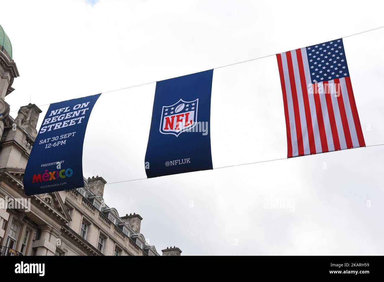 NFL standards, US and Union flags are pictured at Regent Street as part ...