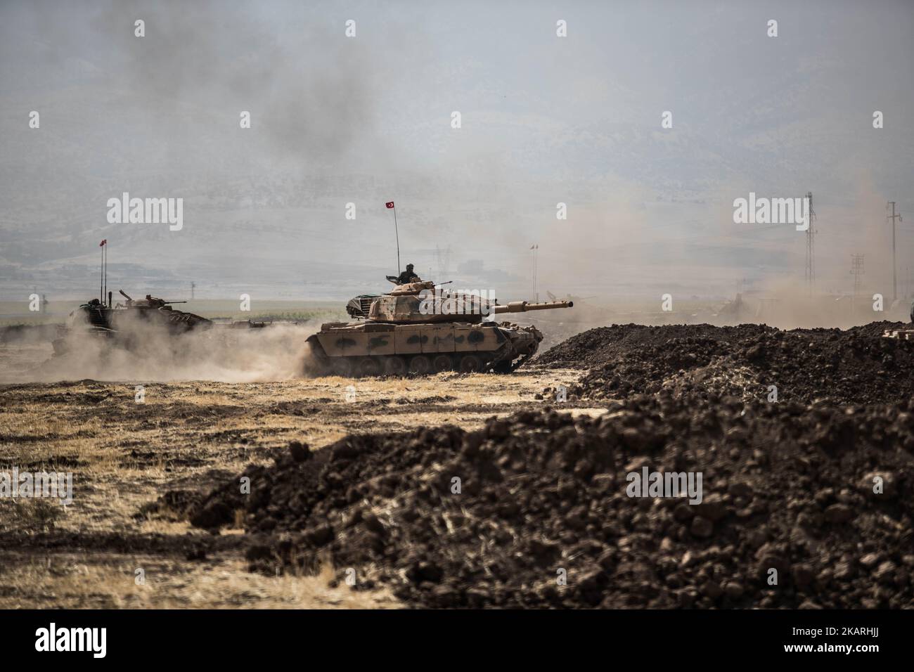 Turkish soldiers with their tanks participate in a military exercise ...