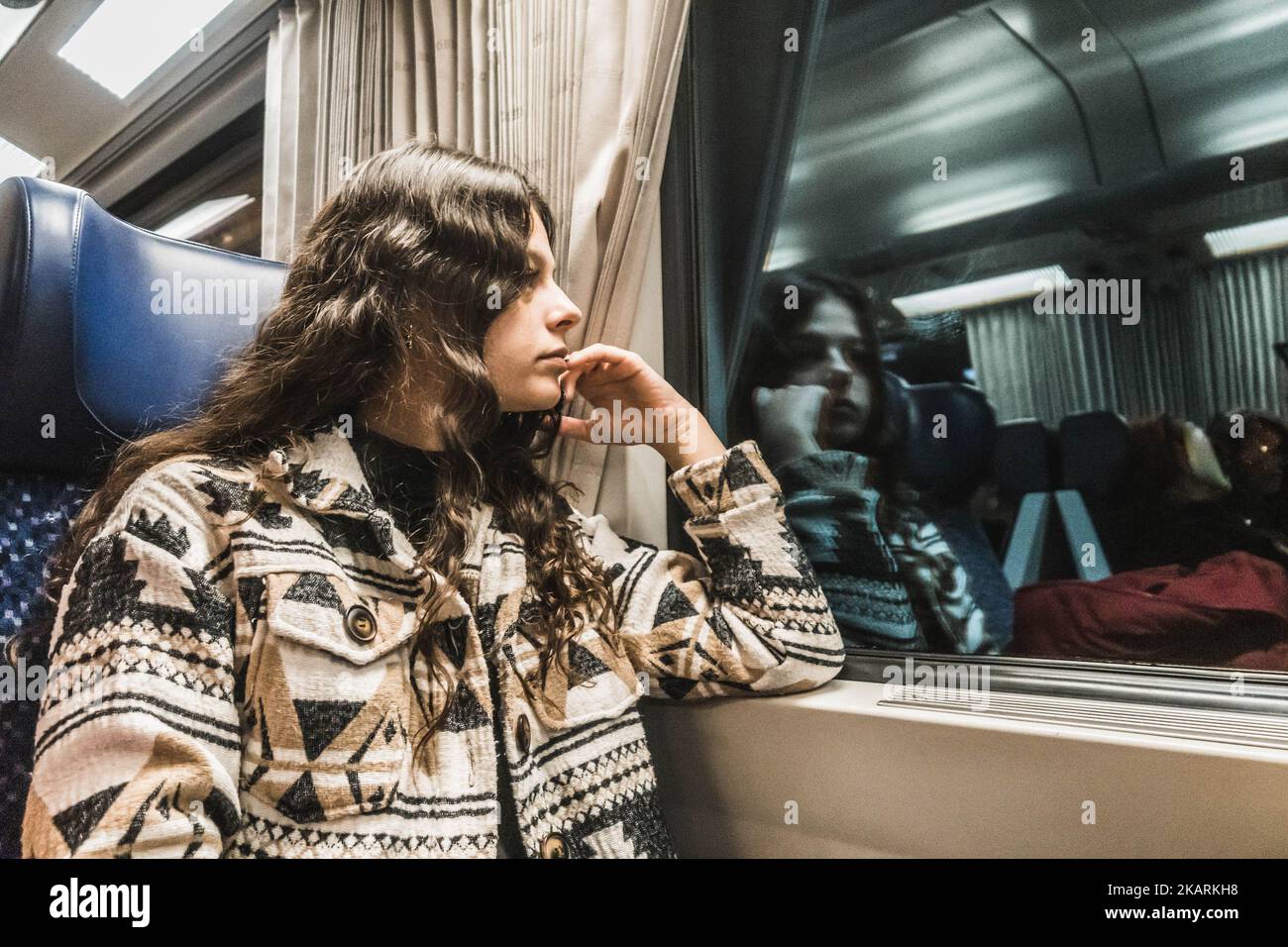 Woman train night hi-res stock photography and images - Alamy