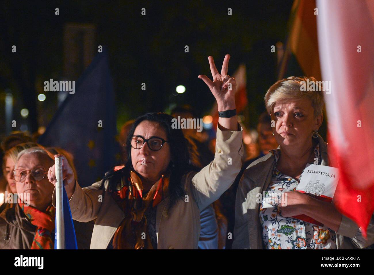 An anti-government candle-lit vigil in front of Krakow's District Court ...