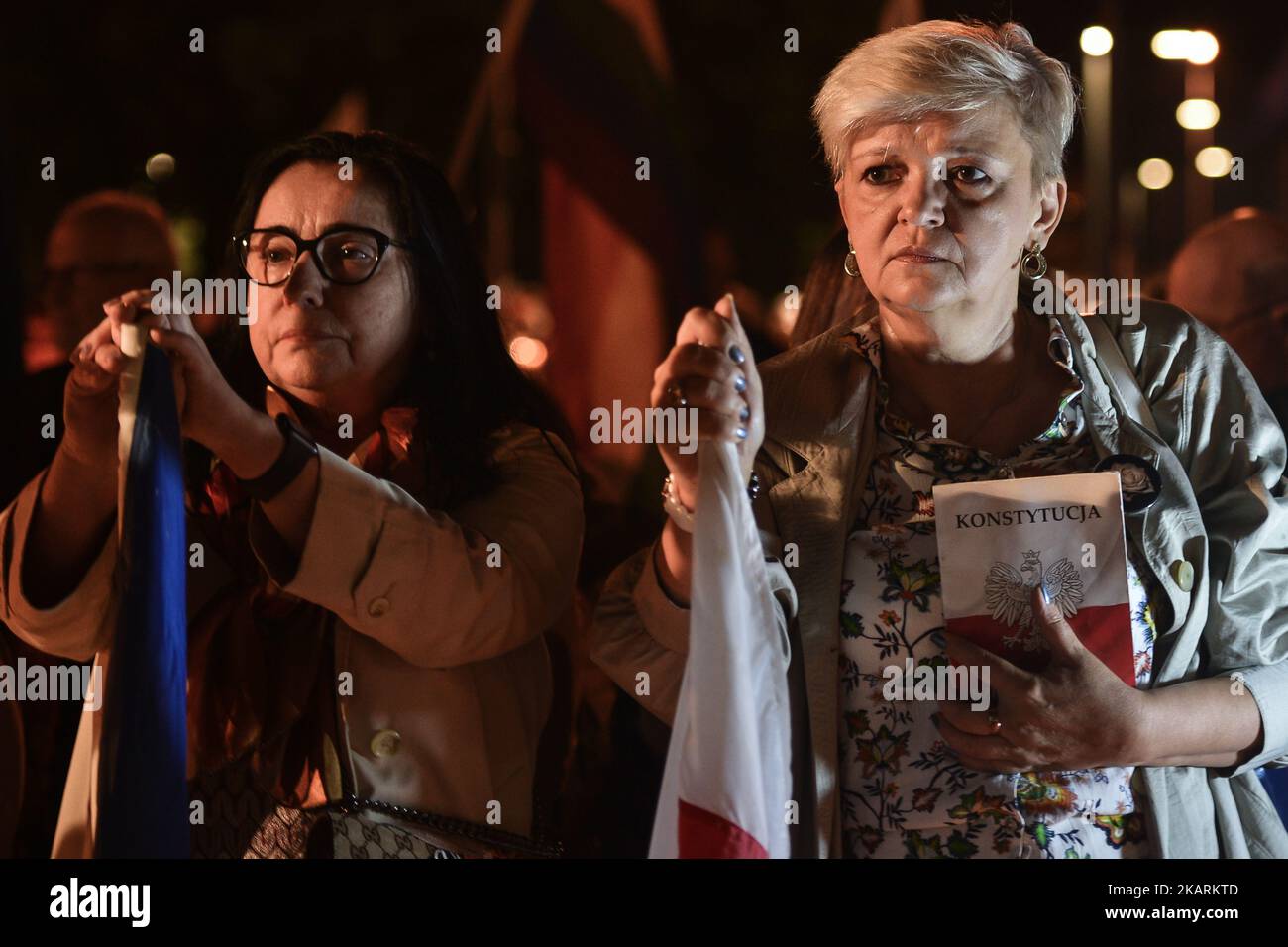 An anti-government candle-lit vigil in front of Krakow's District Court ...