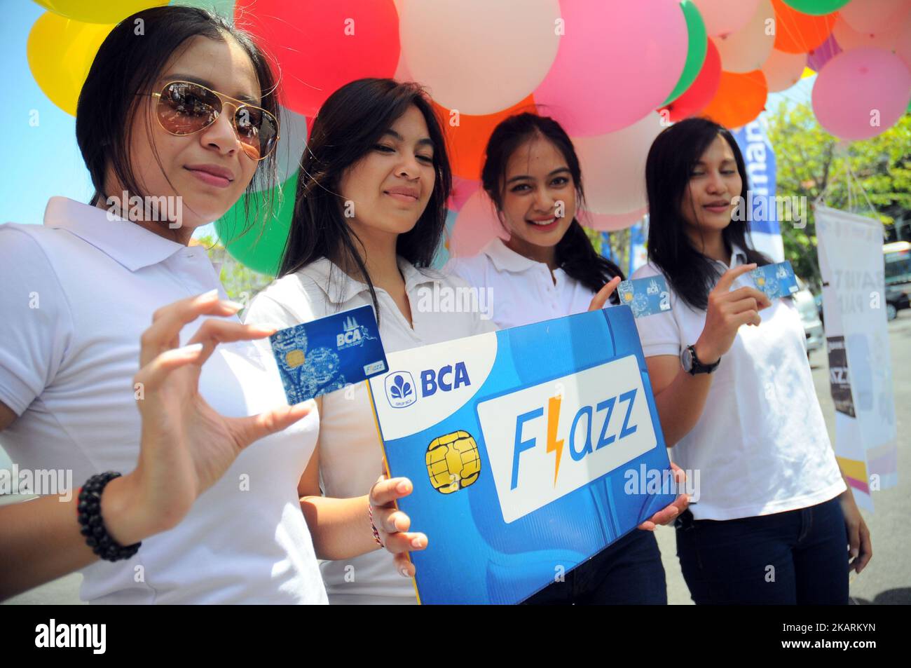 Model shows the electronic cards by banks in Indonesia during the ...