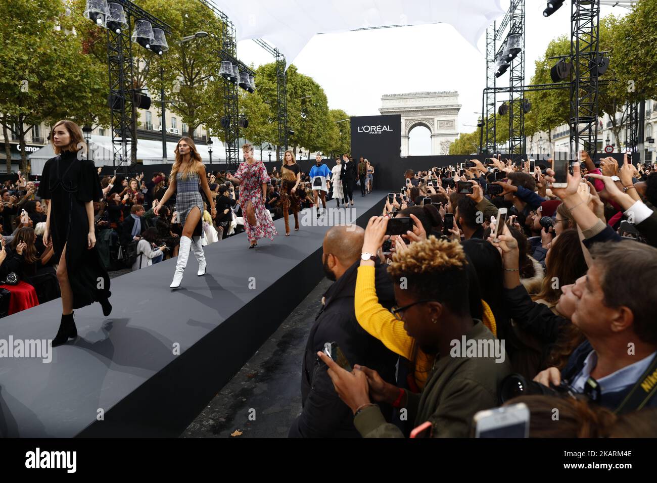 Models walk the runway during the Le Defile L'Oreal Paris show as part ...