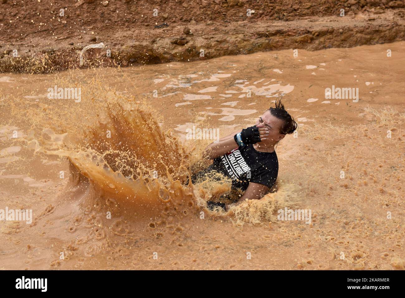 Amateur trail runner slid into a pond for finish line during the North ...