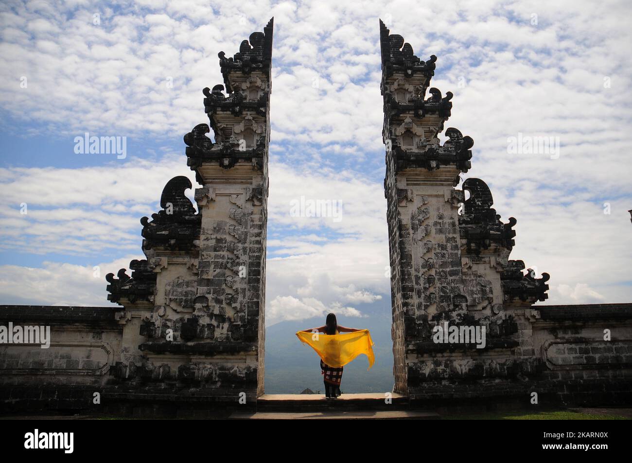 BALI, INDONESIA, OCTOBER-03 : German tourists stood at the gate of Pura ...