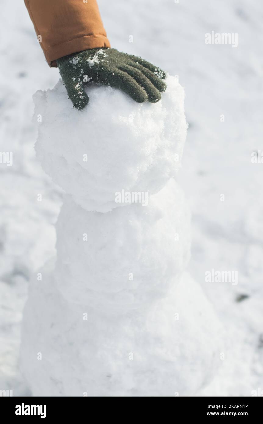 Snowman gloves hi-res stock photography and images - Alamy