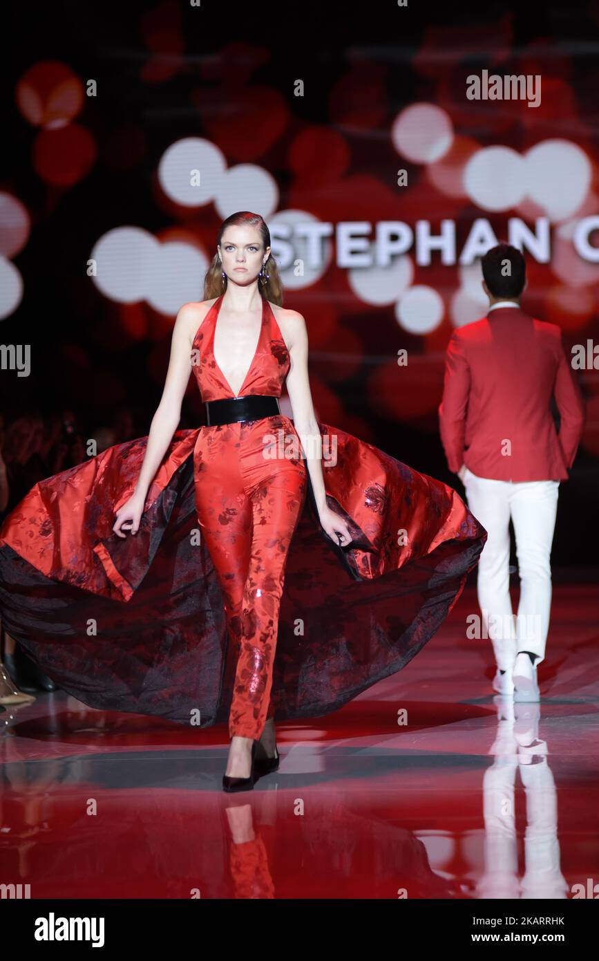 A model walking the runway during CANADA 150 Fashion show on day three ...