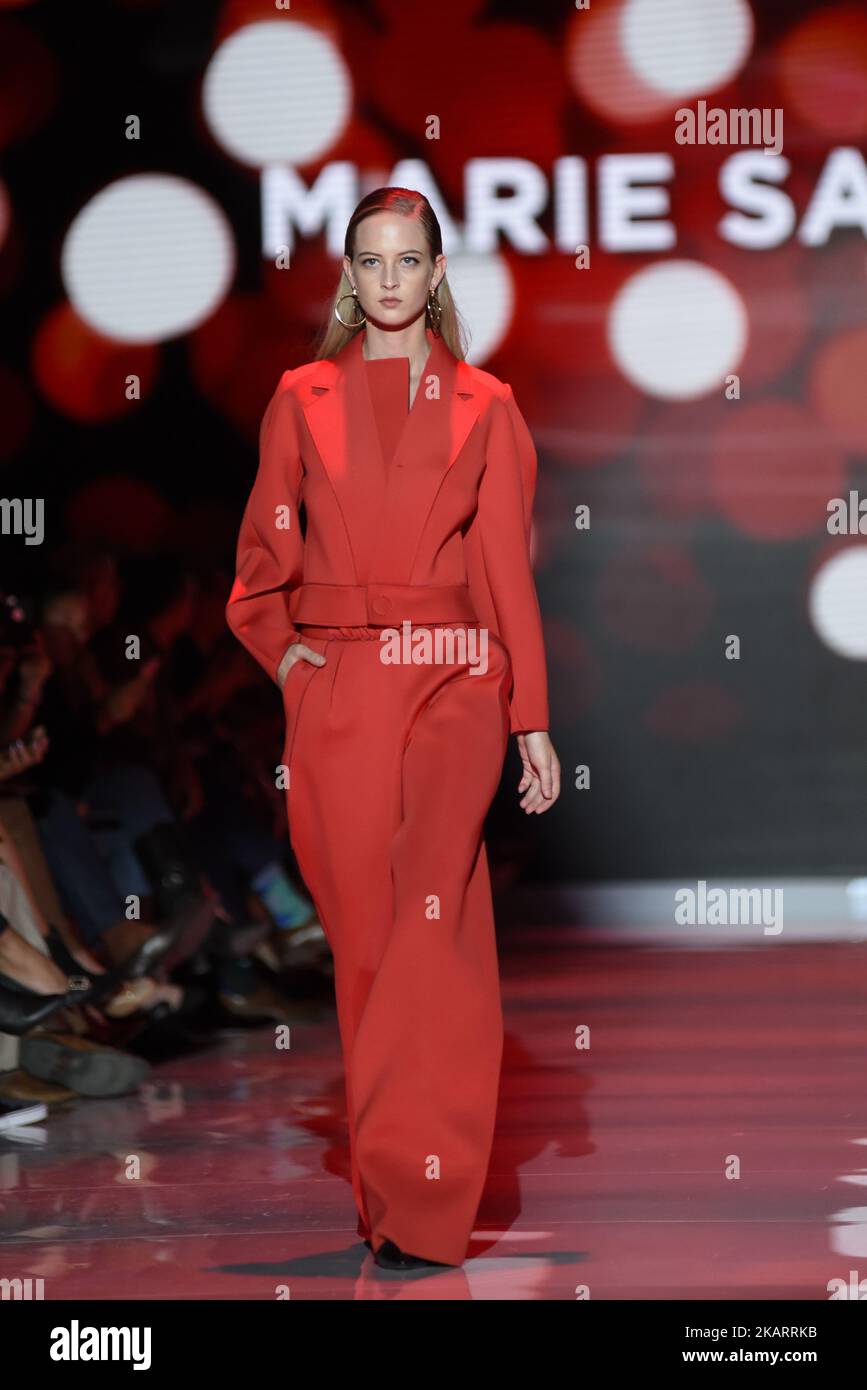 A model walking the runway during CANADA 150 Fashion show on day three ...