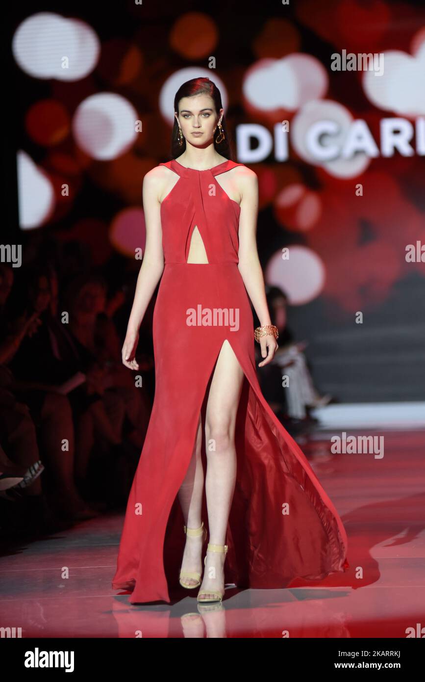 A model walking the runway during CANADA 150 Fashion show on day three ...
