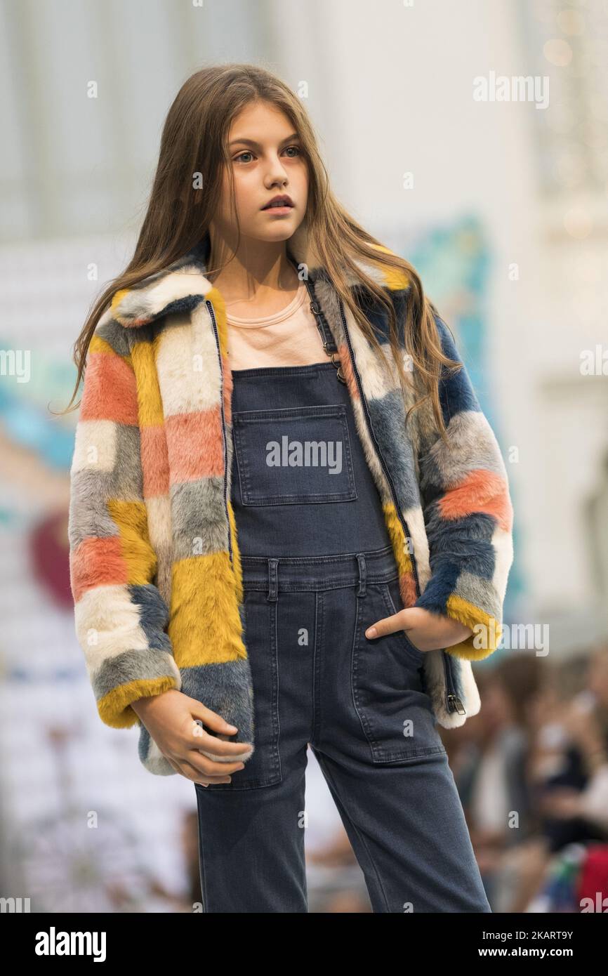 Model walks the runway during 'The Petite Fashion Week' at the Cibeles ...