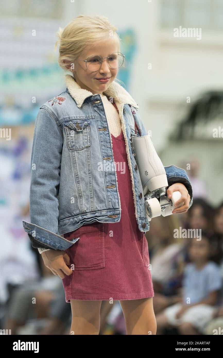 Model walks the runway during 'The Petite Fashion Week' at the Cibeles ...