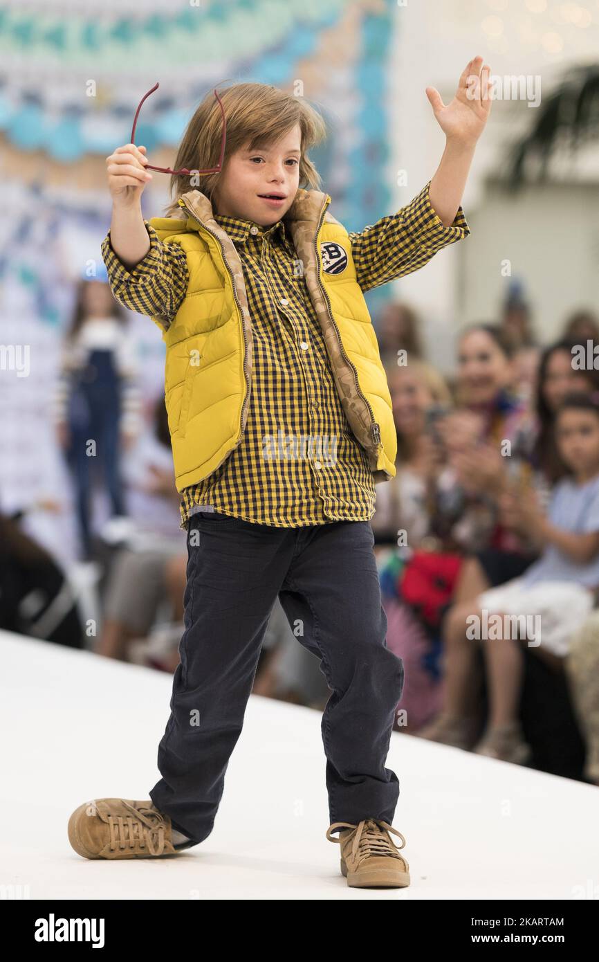 Model walks the runway during 'The Petite Fashion Week' at the Cibeles ...