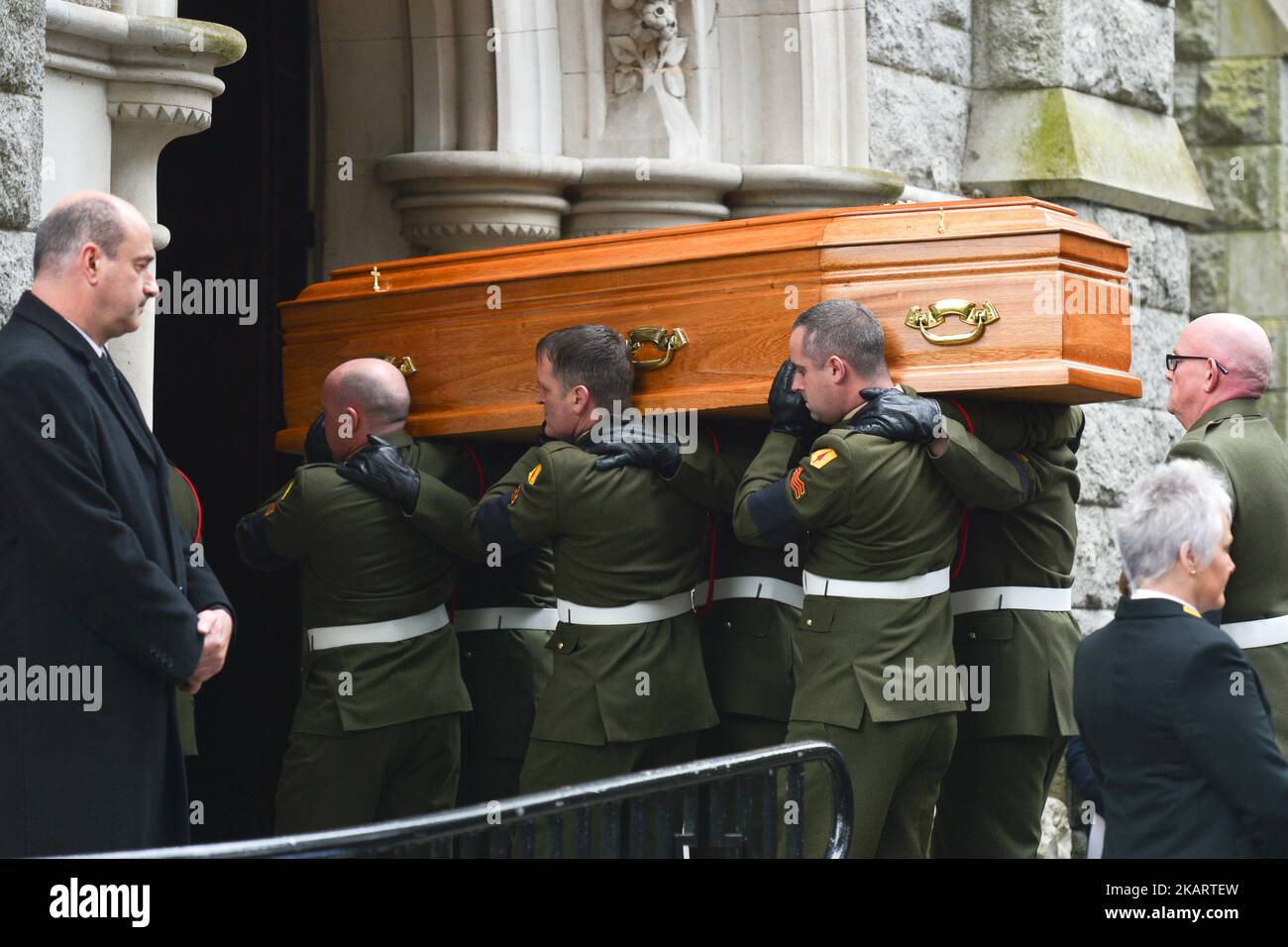 The coffin of former Irish Taoiseach Liam Cosgrave is carried into the ...