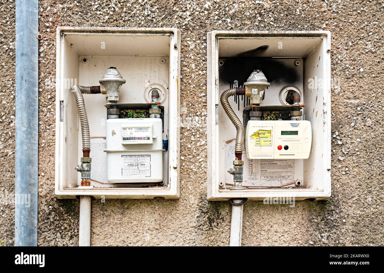 Gas meters on exterior wall Stock Photo - Alamy
