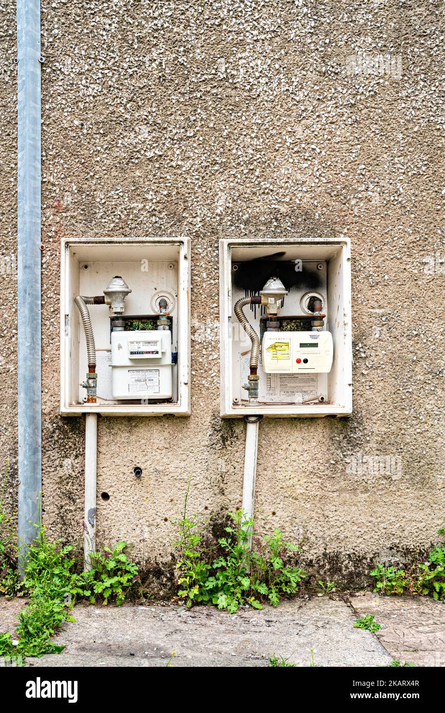 Gas meters on exterior wall Stock Photo - Alamy